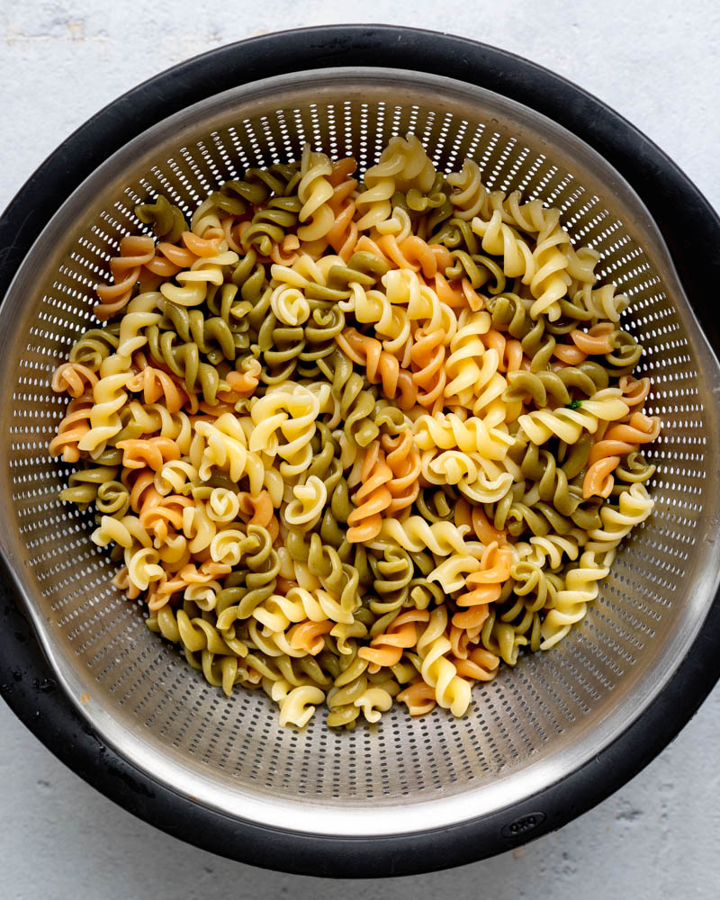 Healthy Tri-Color Pasta Salad with Spinach Basil Sauce • Daisybeet